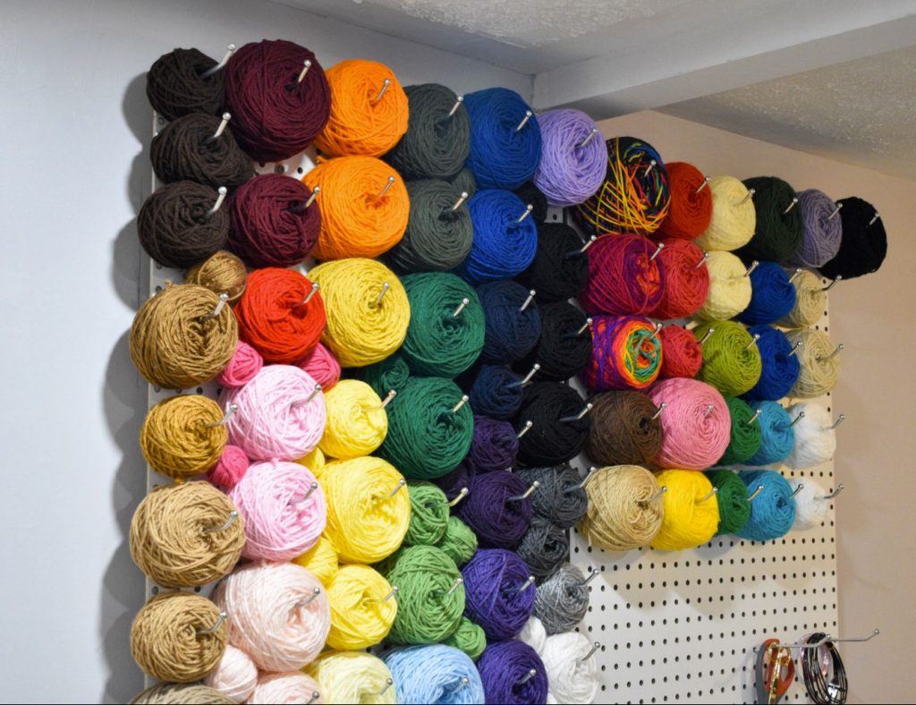 Organize Your Yarn with this Awesome Pegboard Yarn & Craft Wall ...