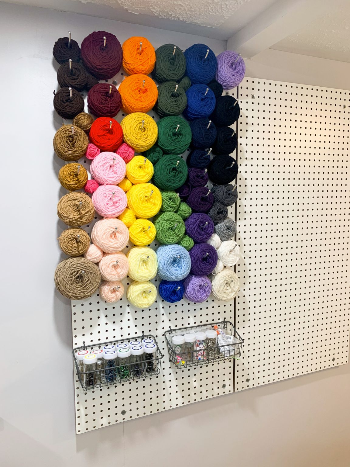 Organize Your Yarn with this Awesome Pegboard Yarn & Craft Wall ...